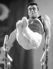 Manuel Carballo, oro en paralelas, y Tania Gener, plata en asimétricas